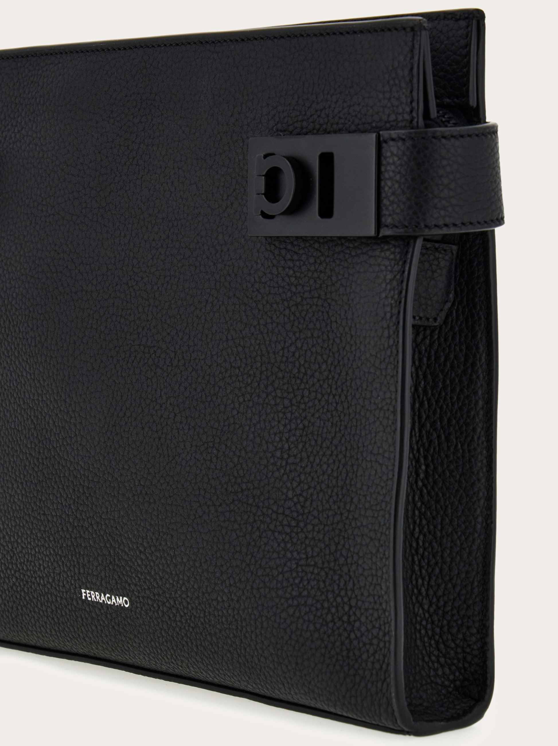 Pouch with Gancini buckles - Men | Ferragamo