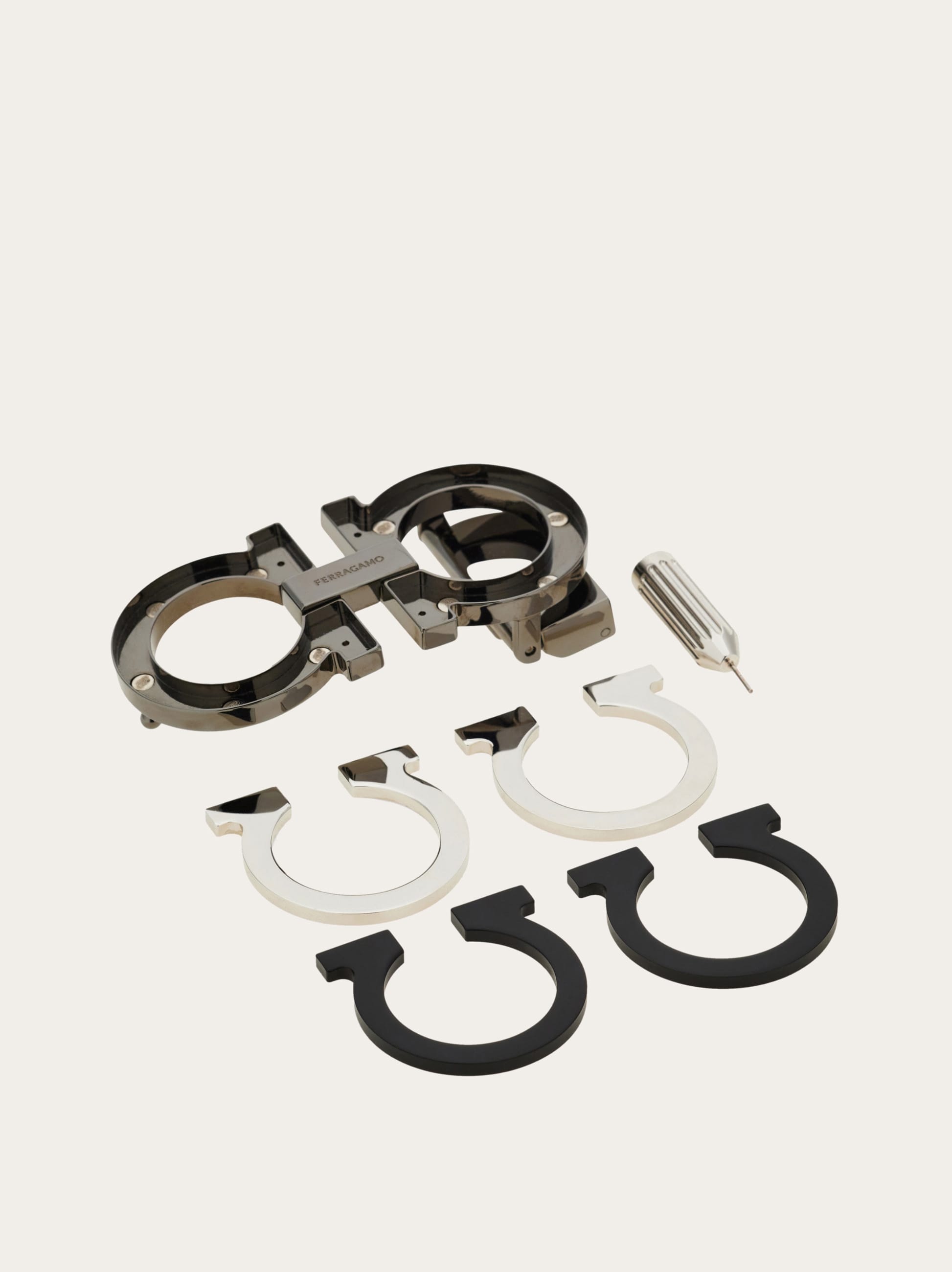 Reversible and adjustable Gancini belt with Switch buckle - Men | Ferragamo