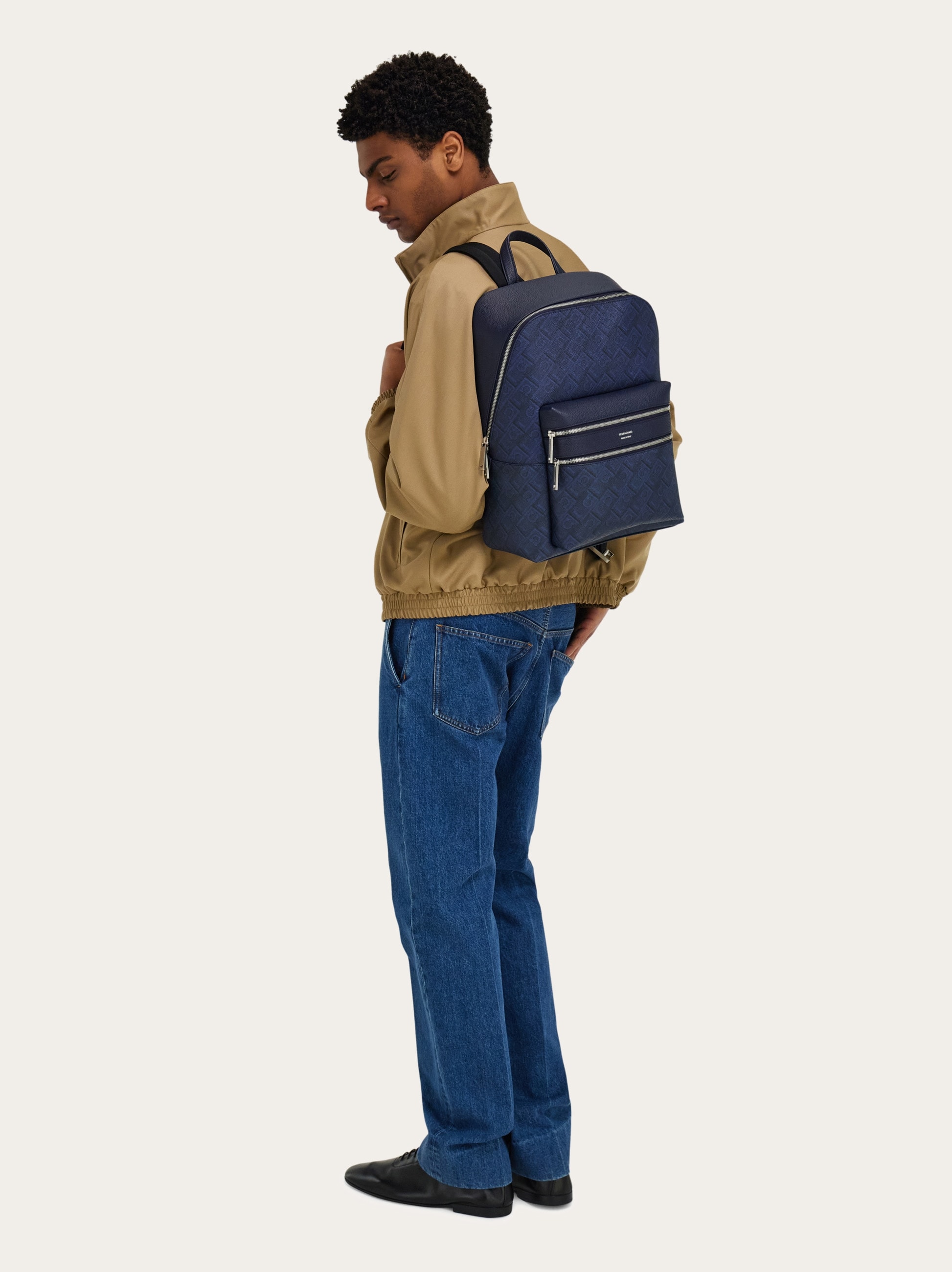 Embossed Gancini backpack - Men | Ferragamo